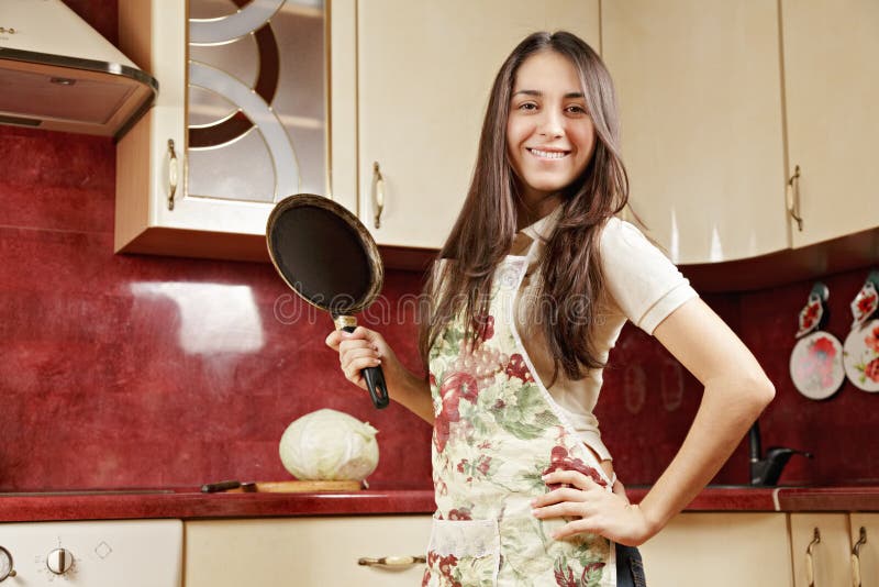 Smiling Woman with Frying Pan Stock Photo - Image of positive, cabinets ...