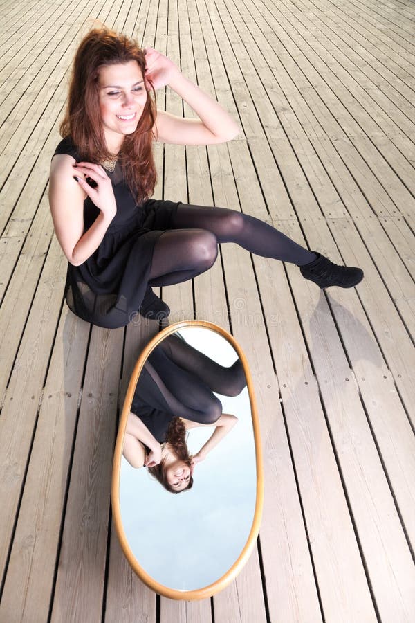 Smiling Woman with Her Reflection in Mirror Stock Photo - Image of ...