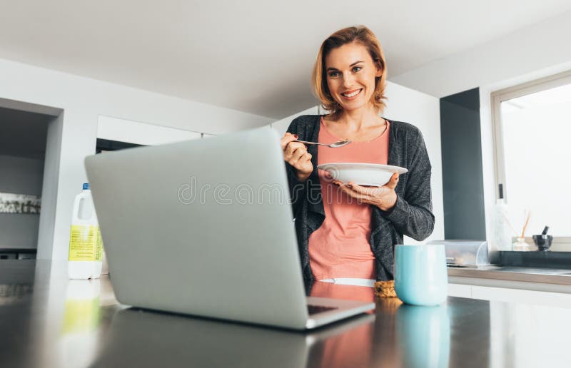 Boy Using Tablet Computer Whilst Eating Breakfast Stock Image - Image ...