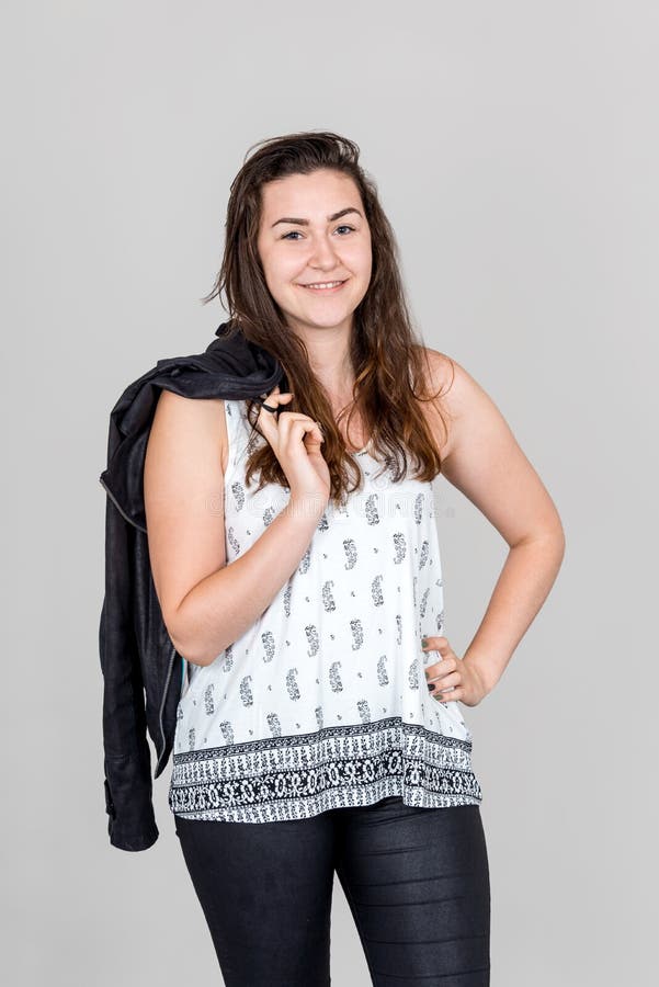 Smiling Woman with Jacket Over Right Shoulder Stock Image - Image of ...