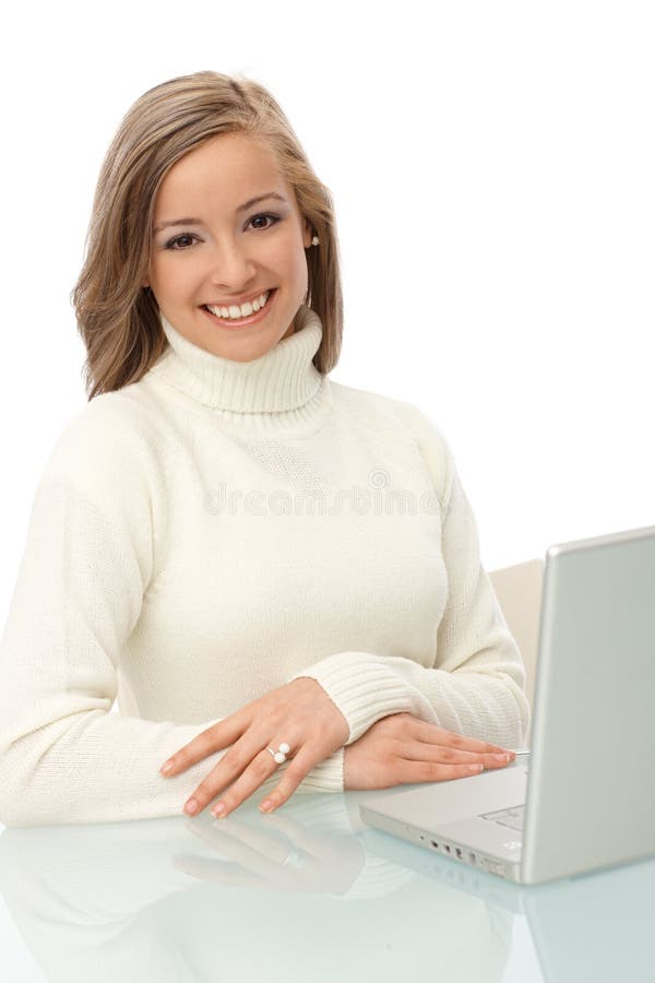 Smiling woman with laptop stock photo. Image of beauty - 25428374