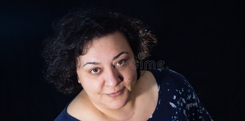 Smiling Woman Leaning Forward Stock Photo - Image of brunette ...