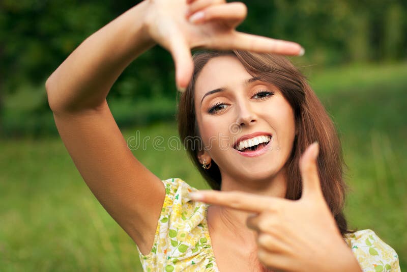 Smiling Woman Making Frame with Her Hands Stock Photo - Image of eyes ...