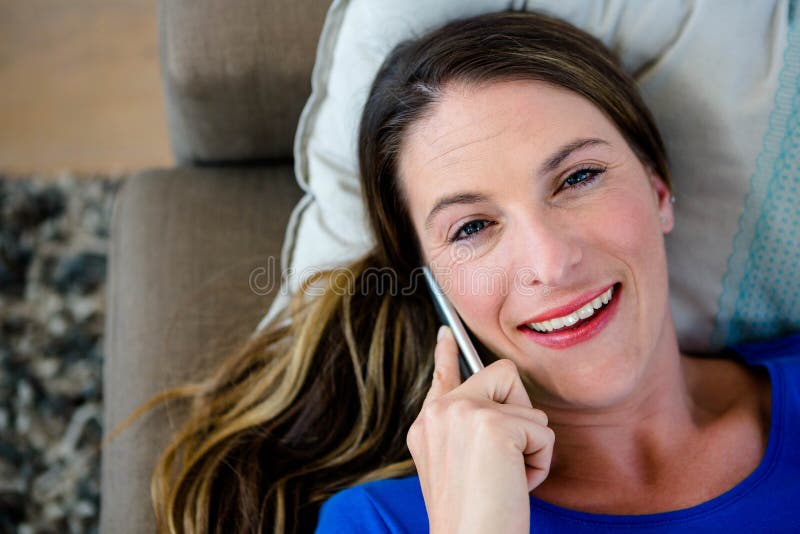 Smiling Woman Making a Phone Call on Her Mobile Stock Photo - Image of ...