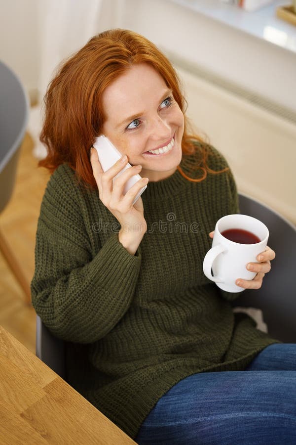 Smiling Woman with Mug of Tea Talking on Phone Stock Photo - Image of ...