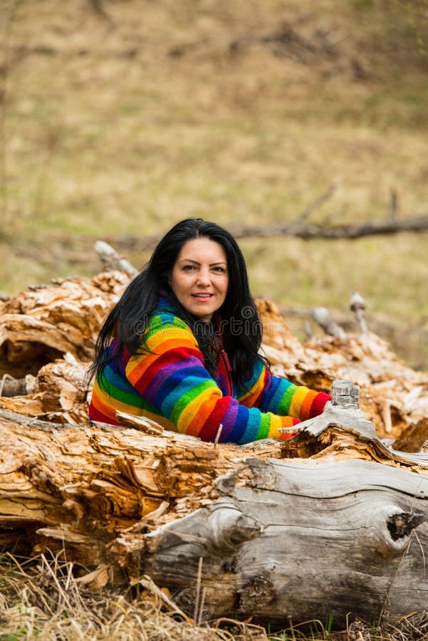 Smiling woman in nature stock photo. Image of pose, brunette - 92434520