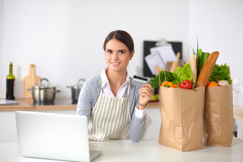 Smiling Woman Online Shopping Using Computer and Stock Photo - Image of ...