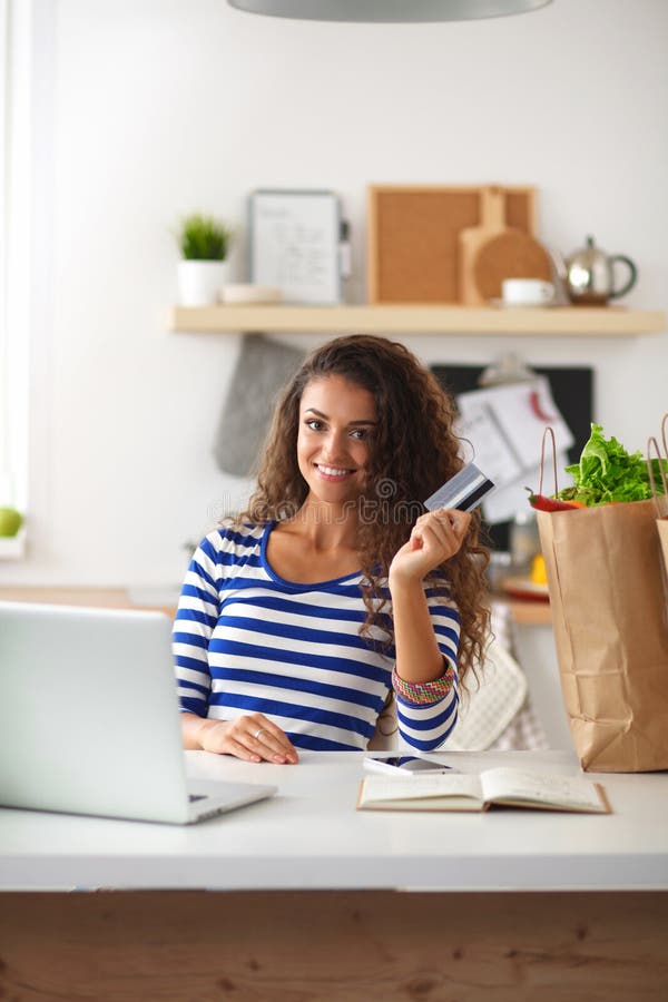 Smiling Woman Online Shopping Using Computer and Stock Photo - Image of ...