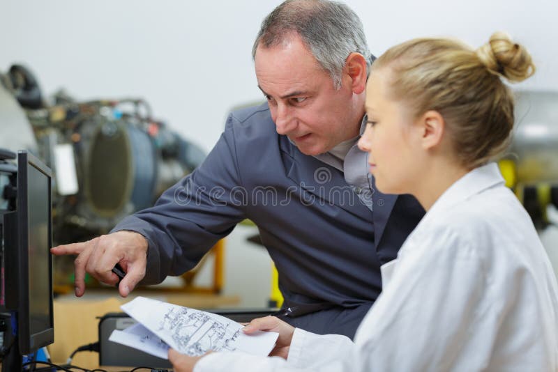Smiling Woman and Pc Engineer Helping in Classroom Stock Photo - Image ...