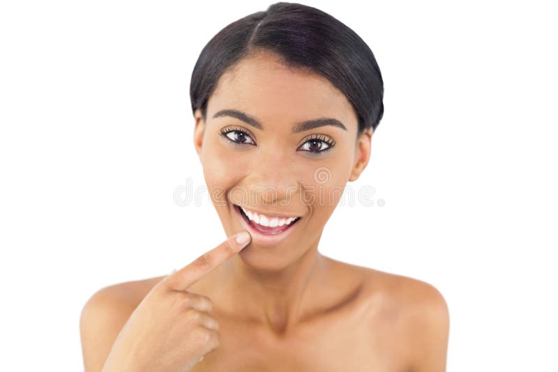 Smiling Woman Pointing at Her Lip Stock Image - Image of gorgeous, shot ...