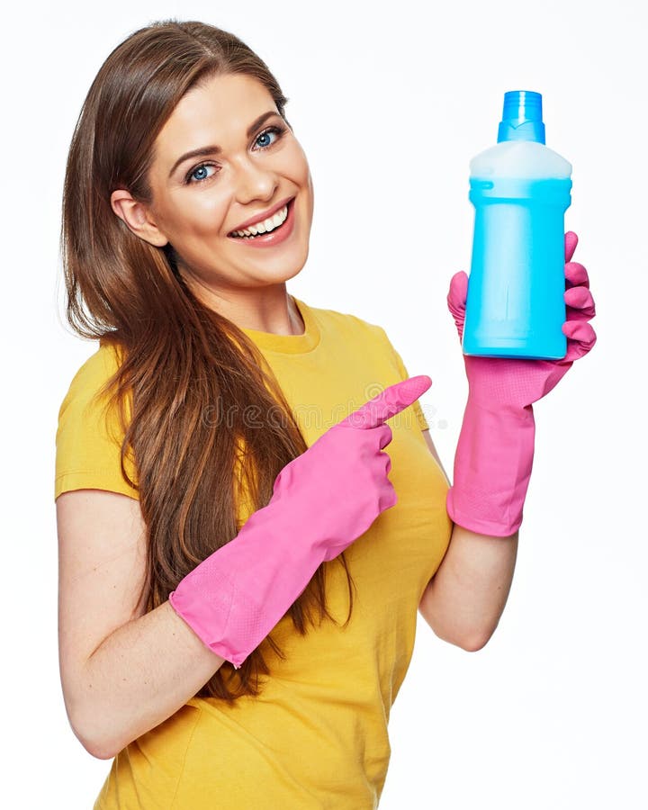 Smiling Woman Pointing To Bottle with Cleaner. Stock Image - Image of ...
