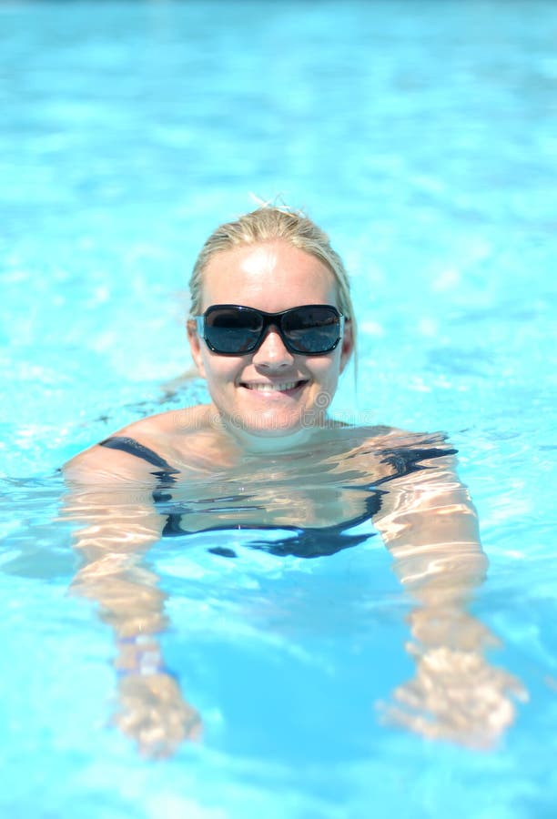 Woman in swimming pool stock photo. Image of exercise - 7143744