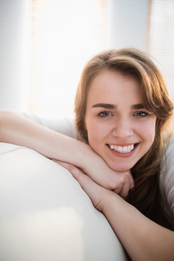 Smiling Woman Posing on the Couch Stock Image - Image of attractive ...