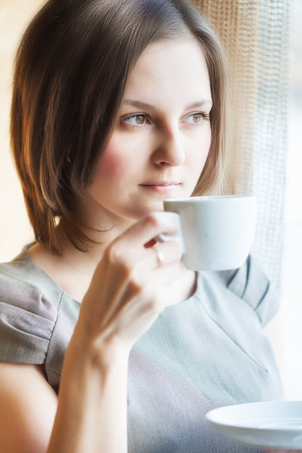 Woman drinking coffee. stock image. Image of drinking - 2425831