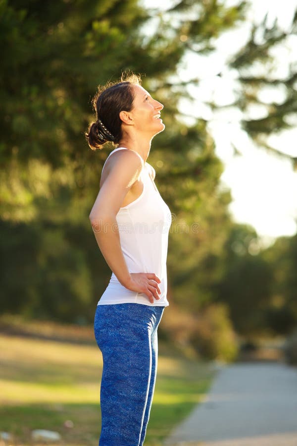 Smiling Woman Resting after Exercise Workout Stock Image - Image of ...