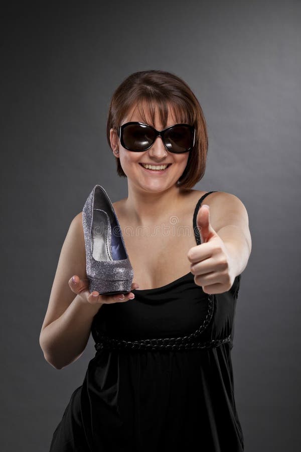 Smiling Woman With Shoe Posing Thumbs Up Stock Image - Image of ...