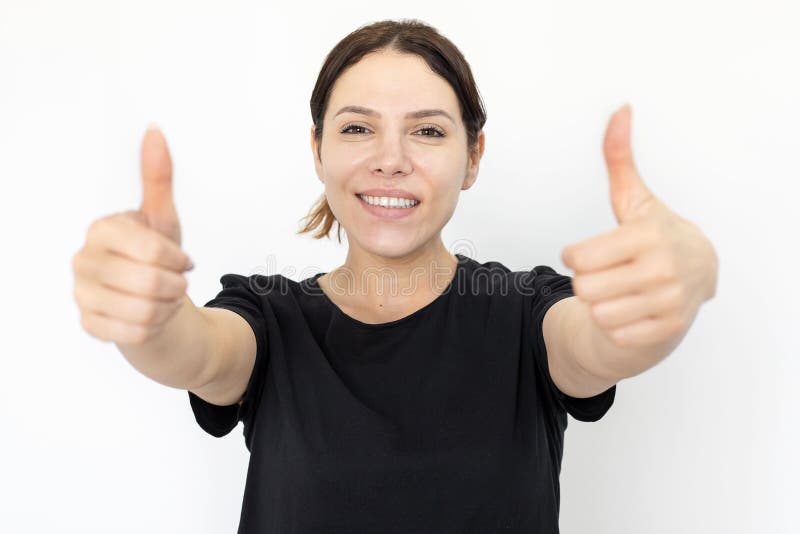 Smiling Woman Showing Thumbs Up Gesture at Camera Stock Image - Image ... Smiling Woman Showing Thumbs Up Gesture at Camera Stock Image - Image ...