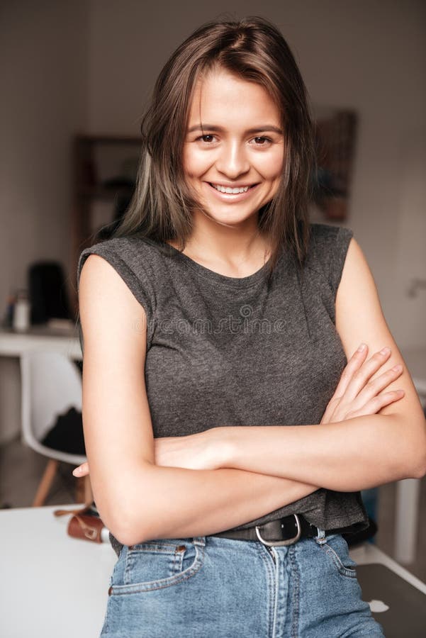 Smiling Woman Standing With Arms Crossed Stock Image Image Of Candid