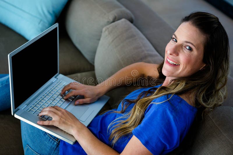 Smiling Woman Typing on Her Laptop Stock Image - Image of computing ...