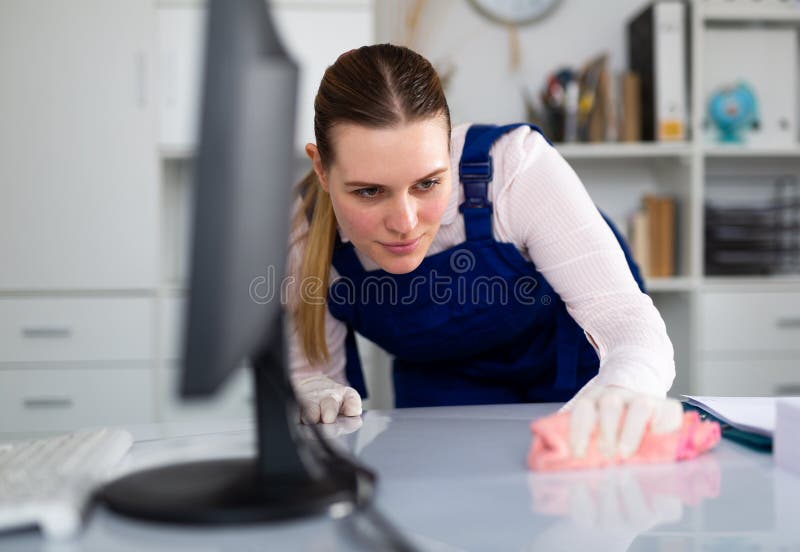 Smiling Woman in Uniform Making Cleaning in the Office Stock Image ...