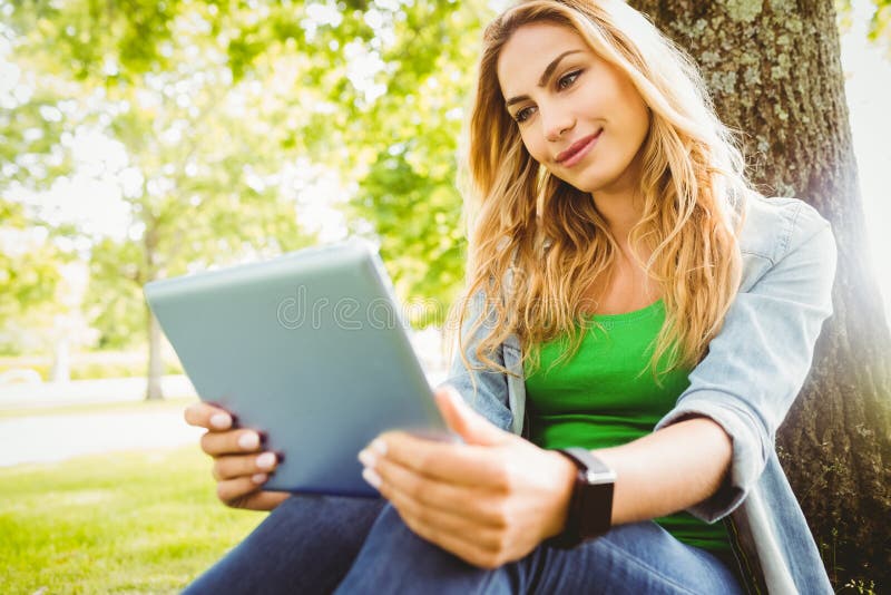 3,943 Woman Smiling Under Tree Photos - Free & Royalty-Free Stock ...