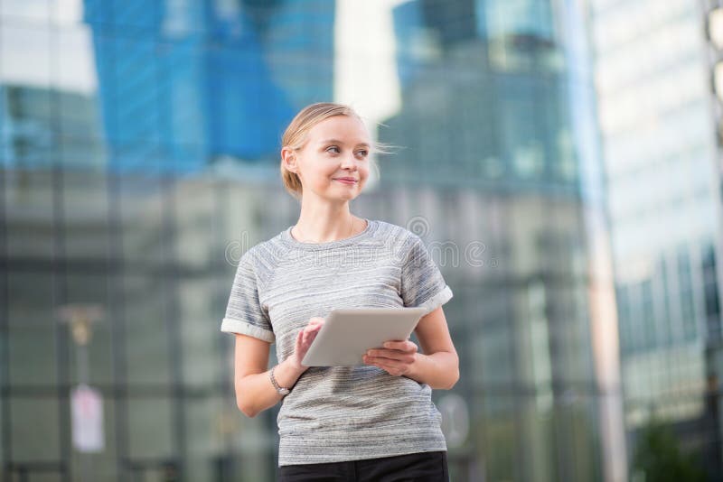 Smiling woman using tablet stock image. Image of executive - 50767573