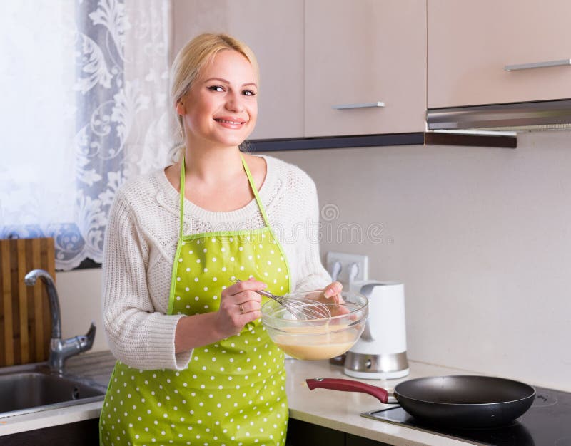 Smiling woman using whisk stock photo. Image of dough - 58170238