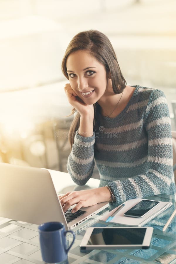 Smiling woman at work stock photo. Image of relax, computer - 55222620