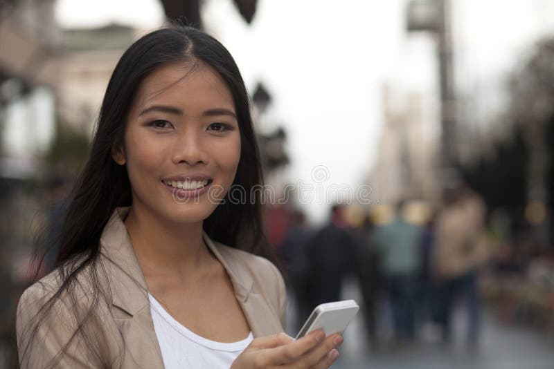 Smiling Women with Cell Phone Stock Photo - Image of speak, adult: 68740764