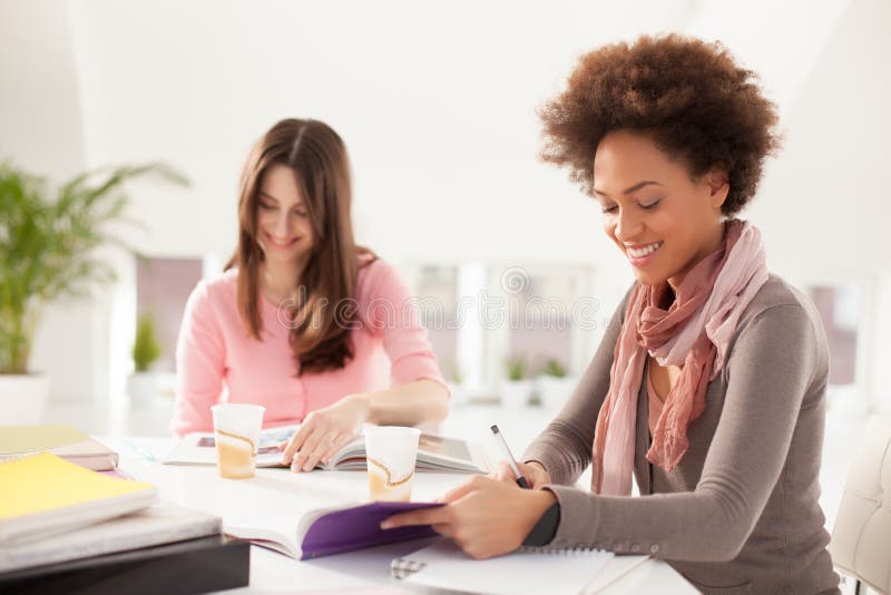 Smiling Women Studying Together Stock Image - Image of read, school ...