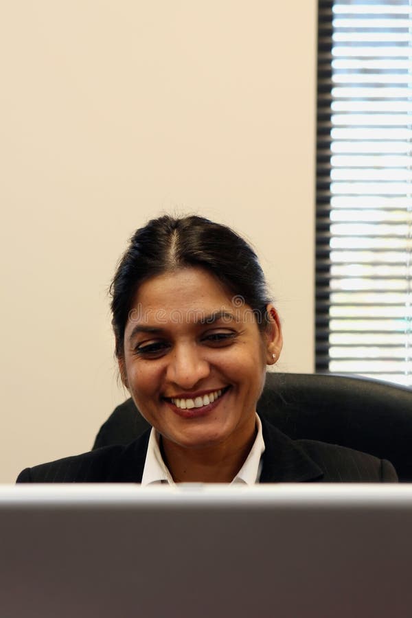 Smiling at Work stock photo. Image of women, person, executive - 5114668