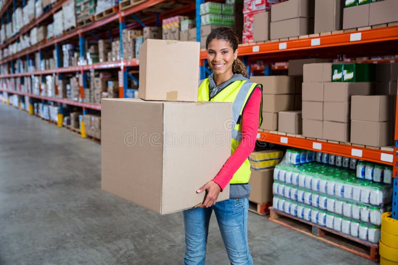 Smiling Worker Holding Boxes Stock Photo - Image of pallet ...