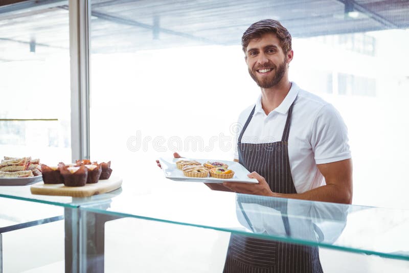 Smiling Worker Posing Behind the Counter Stock Photo - Image of ...