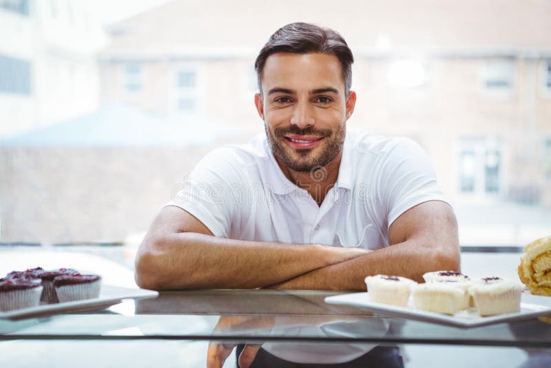 Smiling Worker Posing Behind the Counter Stock Image - Image of ...