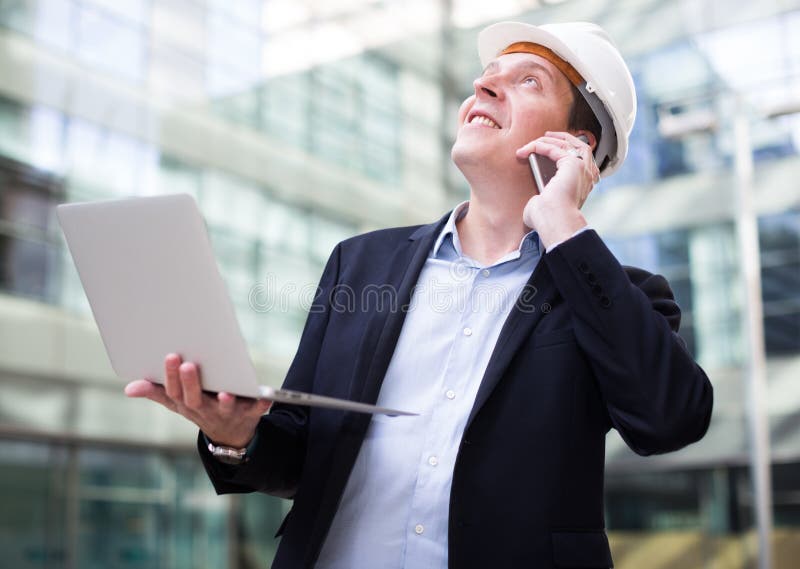Smiling Worker Talking at Mobile Phone Stock Image - Image of modern ...