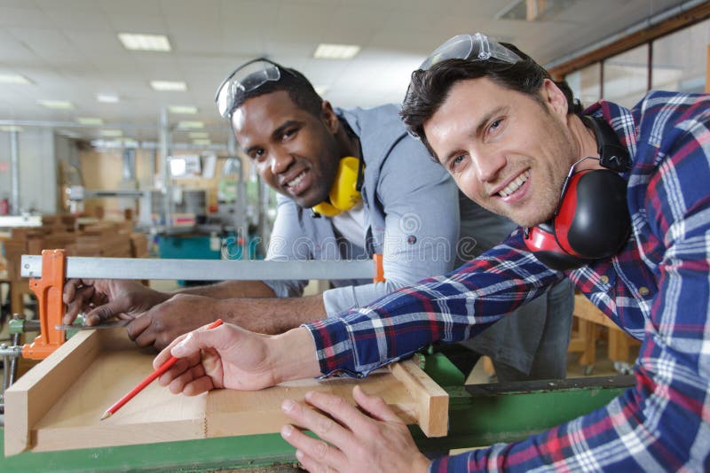 Smiling Workers in Carpenters Workshop Stock Photo - Image of business ...