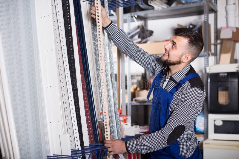 Smiling Workman Deciding on Plastic Trim Corners Stock Image - Image of ...