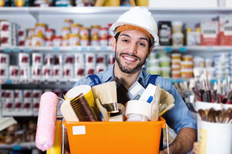 Smiling Workman with Tools in Hands with Purchases Stock Image - Image ...