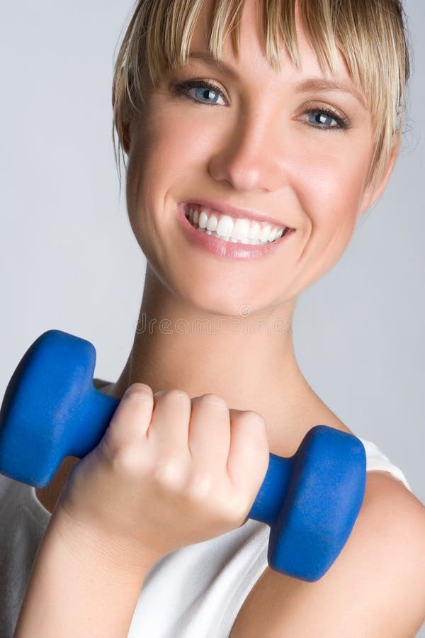 Smiling Workout Girl stock image. Image of lifting, dumbells - 11893215