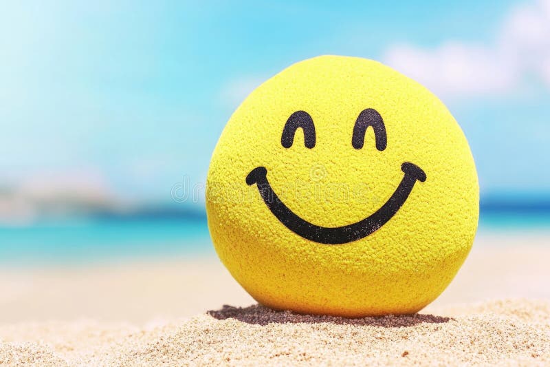 Smiling Yellow Emoji Ball on Sandy Beach with Bright Blue Sky Stock ...