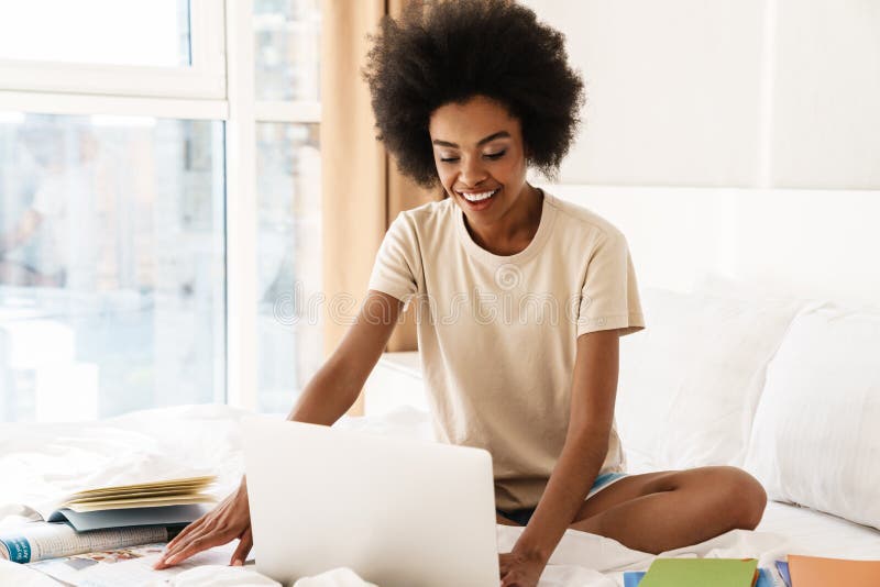 Smiling Young African Girl Studying Stock Image - Image of female ...