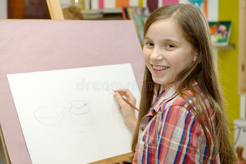 A Smiling Young Artist Girl Draw Stock Photo - Image of schoolgirl ...
