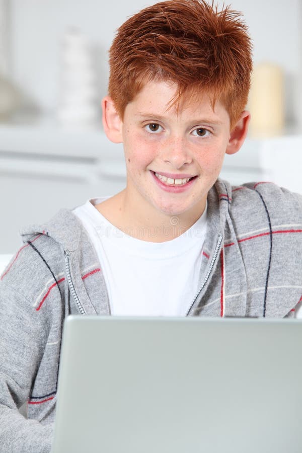 Young Boy on His Laptop Computer Stock Photo - Image of smiling ...