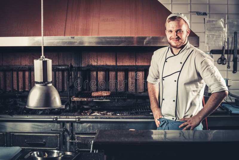 Smiling young chef stock photo. Image of hands, barbecue - 80536004