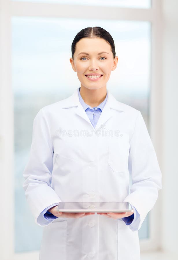 Smiling Young Doctor with Tablet Pc in Cabinet Stock Image - Image of ... Smiling Young Doctor with Tablet Pc in Cabinet Stock Image - Image of ...