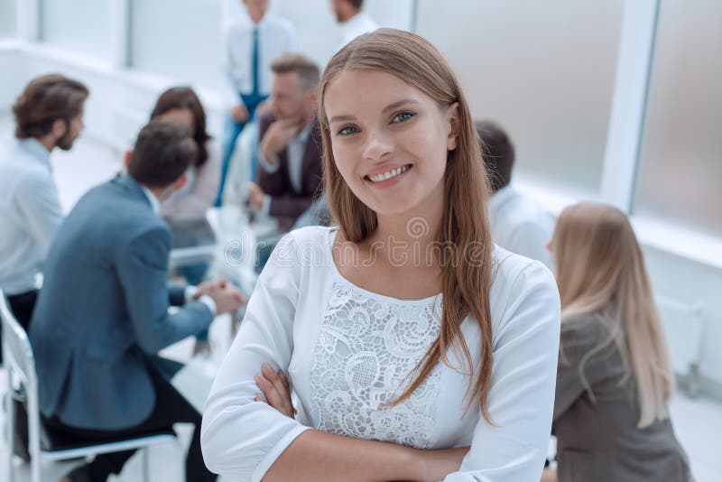 Smiling Young Employee Standing in Business Office. Stock Image - Image ...