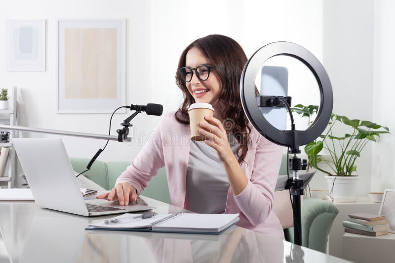 Smiling Young Female Content Creator and Influencer Drink Coffee, Using ...