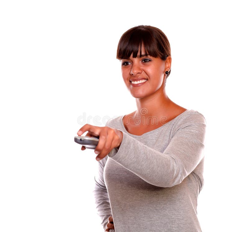 Smiling Young Female Using a Tv Remote Stock Photo - Image of people ...