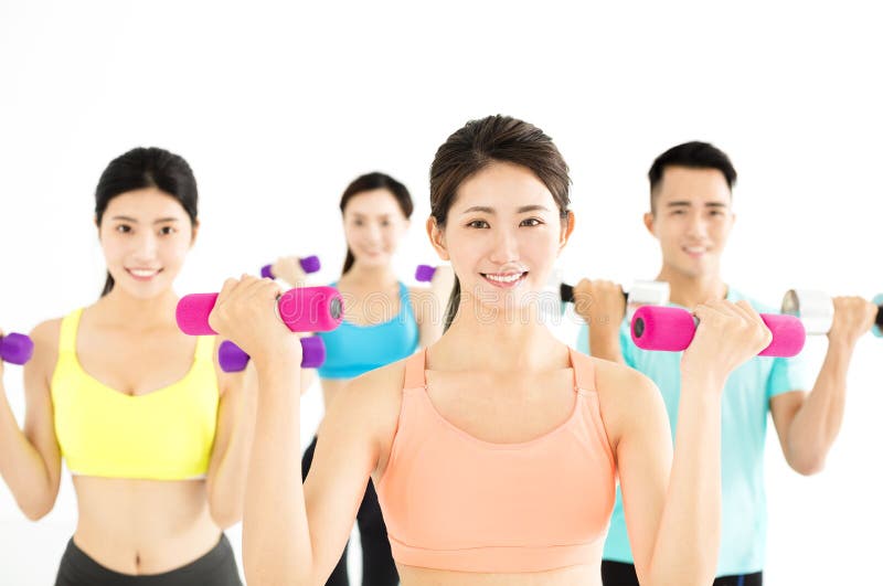 Smiling Young Fit Group Stretching in Gym Stock Photo - Image of active ...
