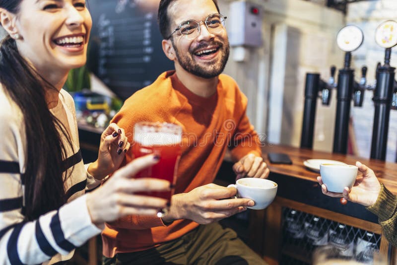 Young Friends Drinking Craft Beer and Coffee in Pub Stock Image - Image ...